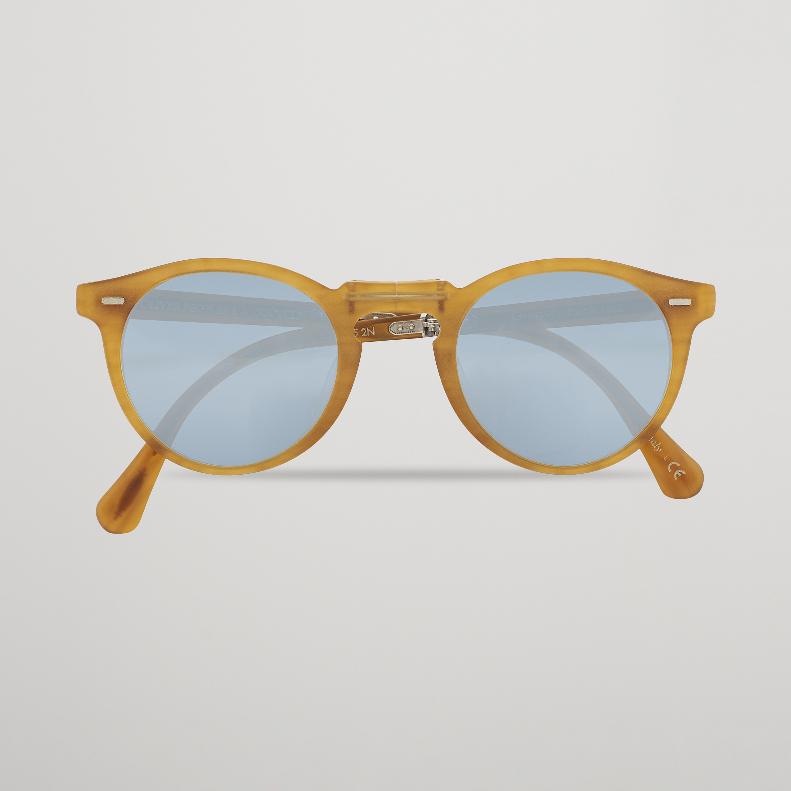 Oliver Peoples Gregory Peck 1962 Folding Sunglasses Matte Amber at CareOfCa