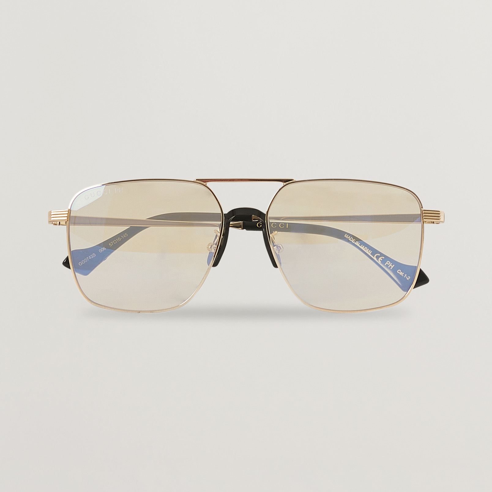 Gucci GG0743S Photochromic Sunglasses Shiny Endura Gold at CareOfCarl.com