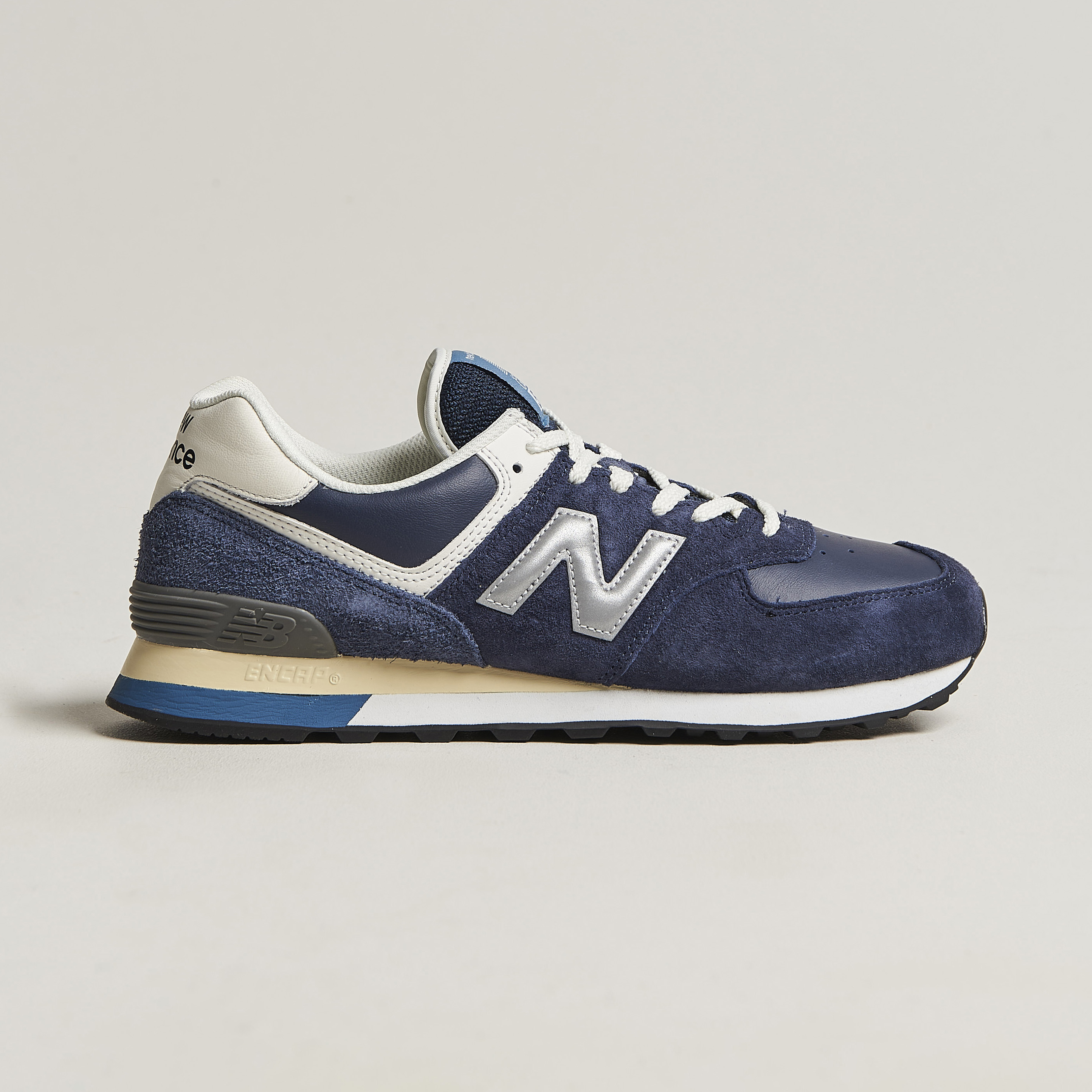 New Balance 574 Sneaker Navy at CareOfCarl.com