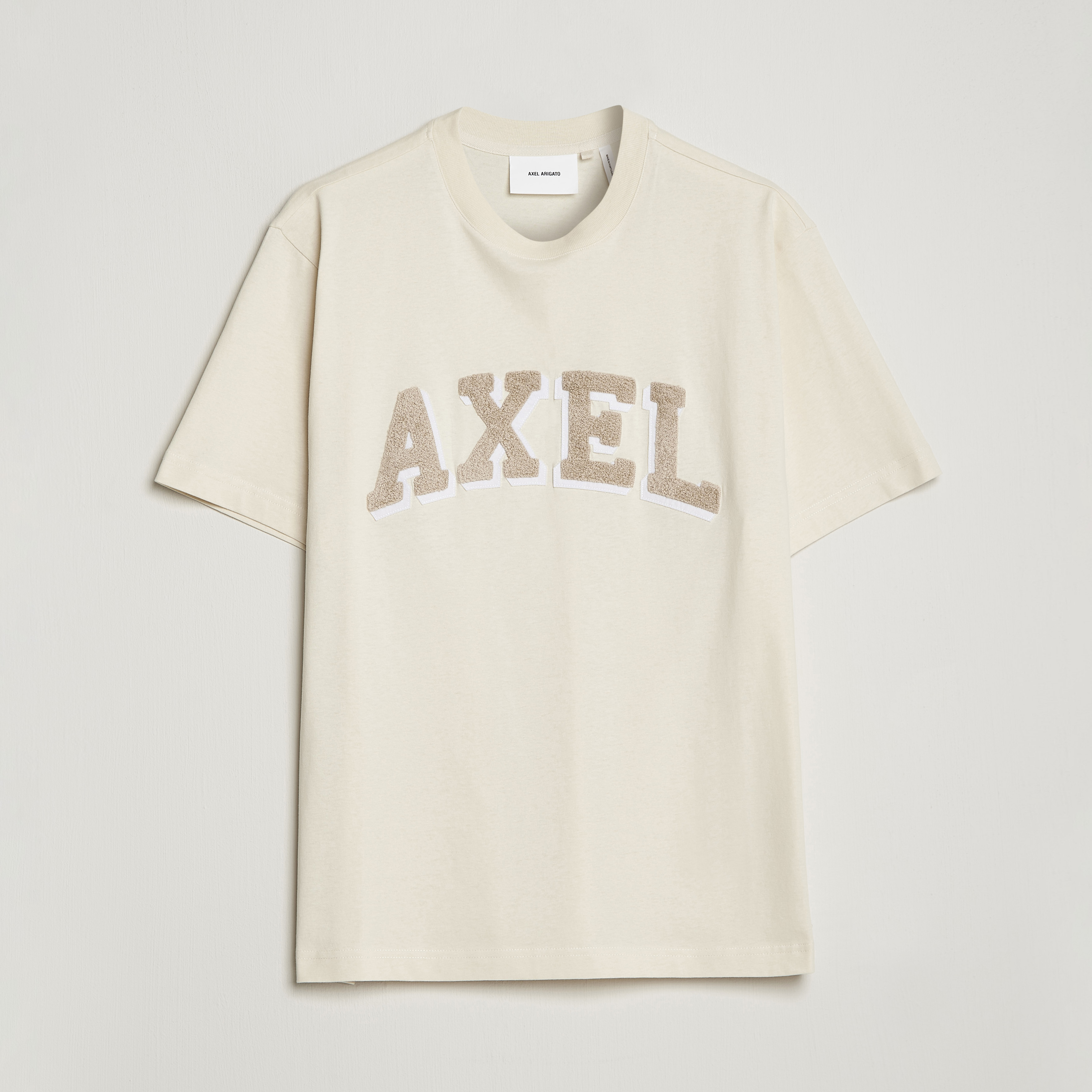Axel Arigato Axel Arc T-Shirt Pale Beige at CareOfCarl.com