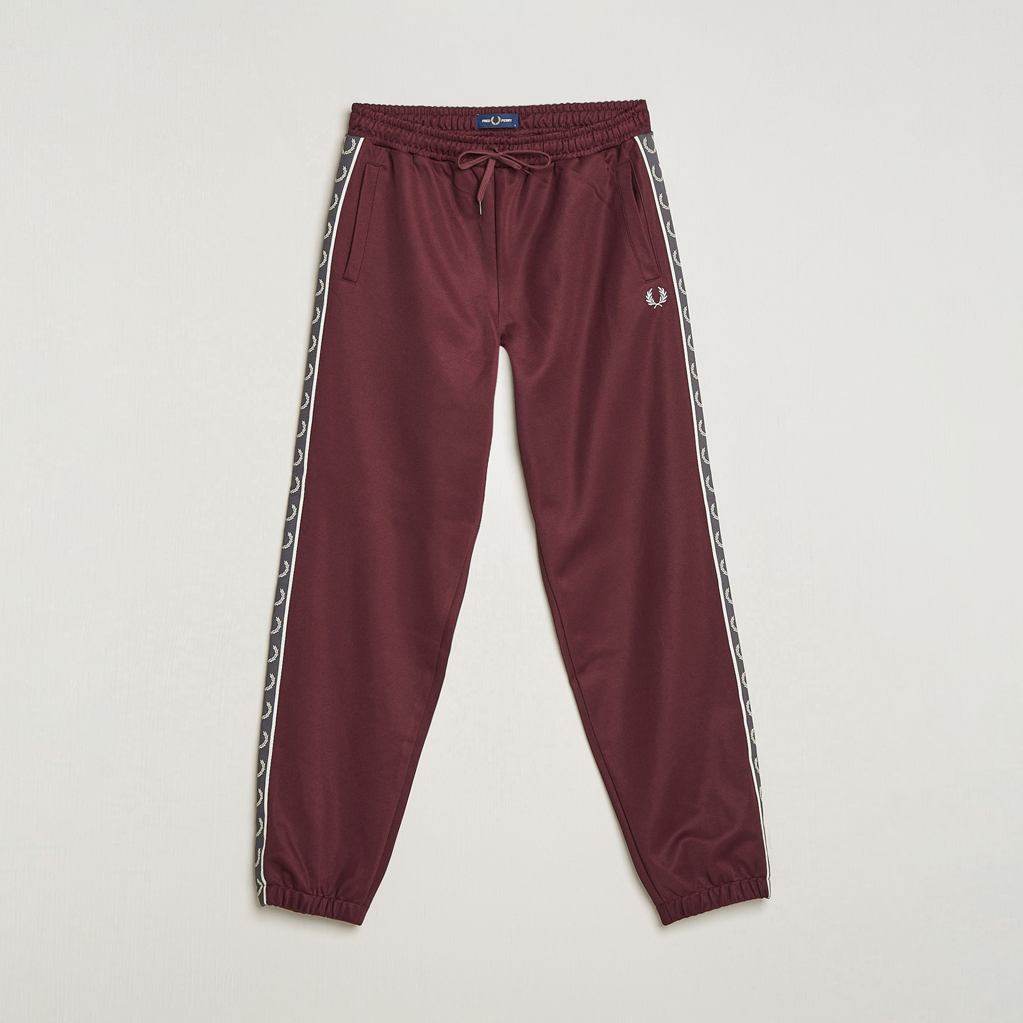 Fred Perry Taped Track Pants Oxblood at CareOfCarl.com