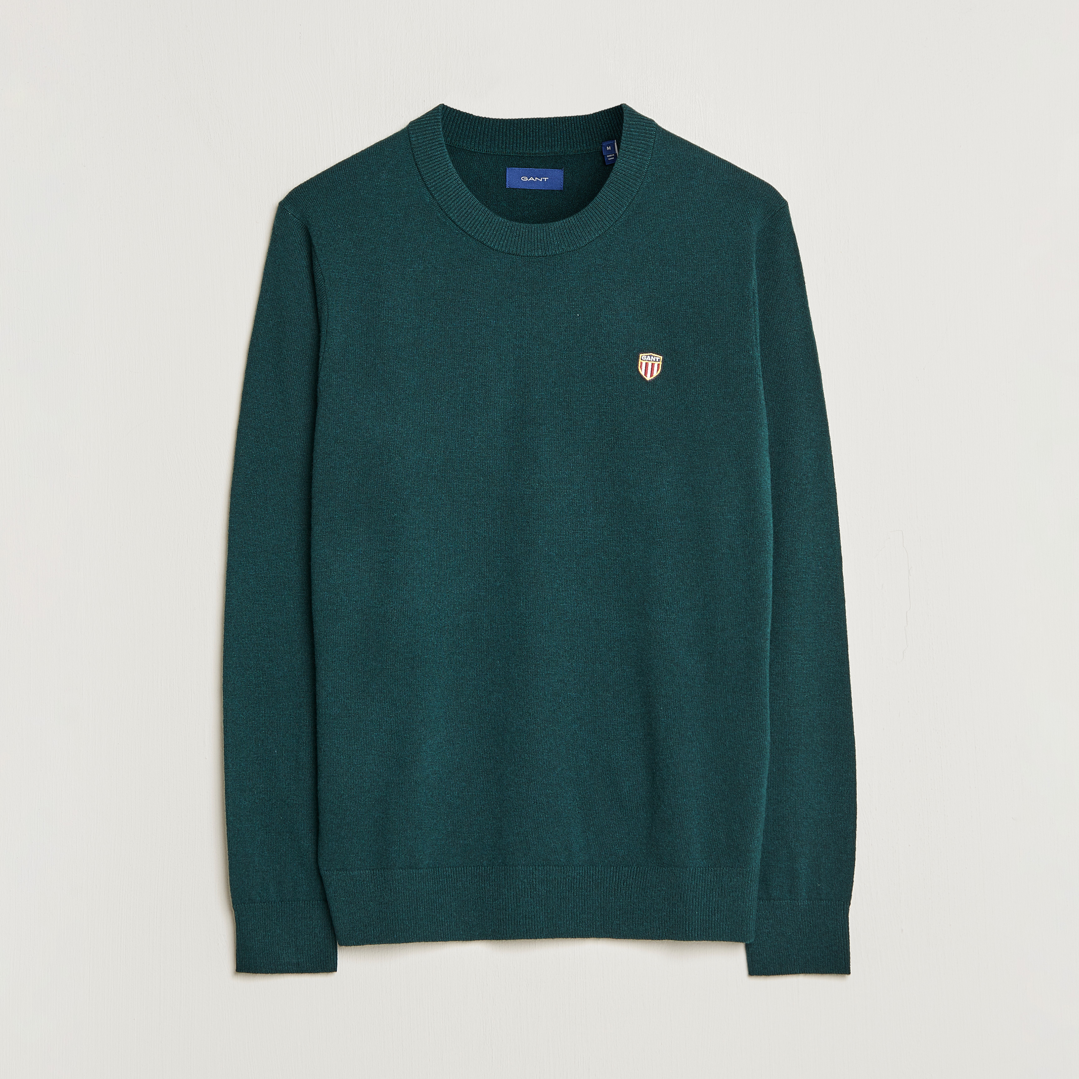 GANT Banner Shield Lambswool Crew Neck Ratran Green at CareOfCarl.com