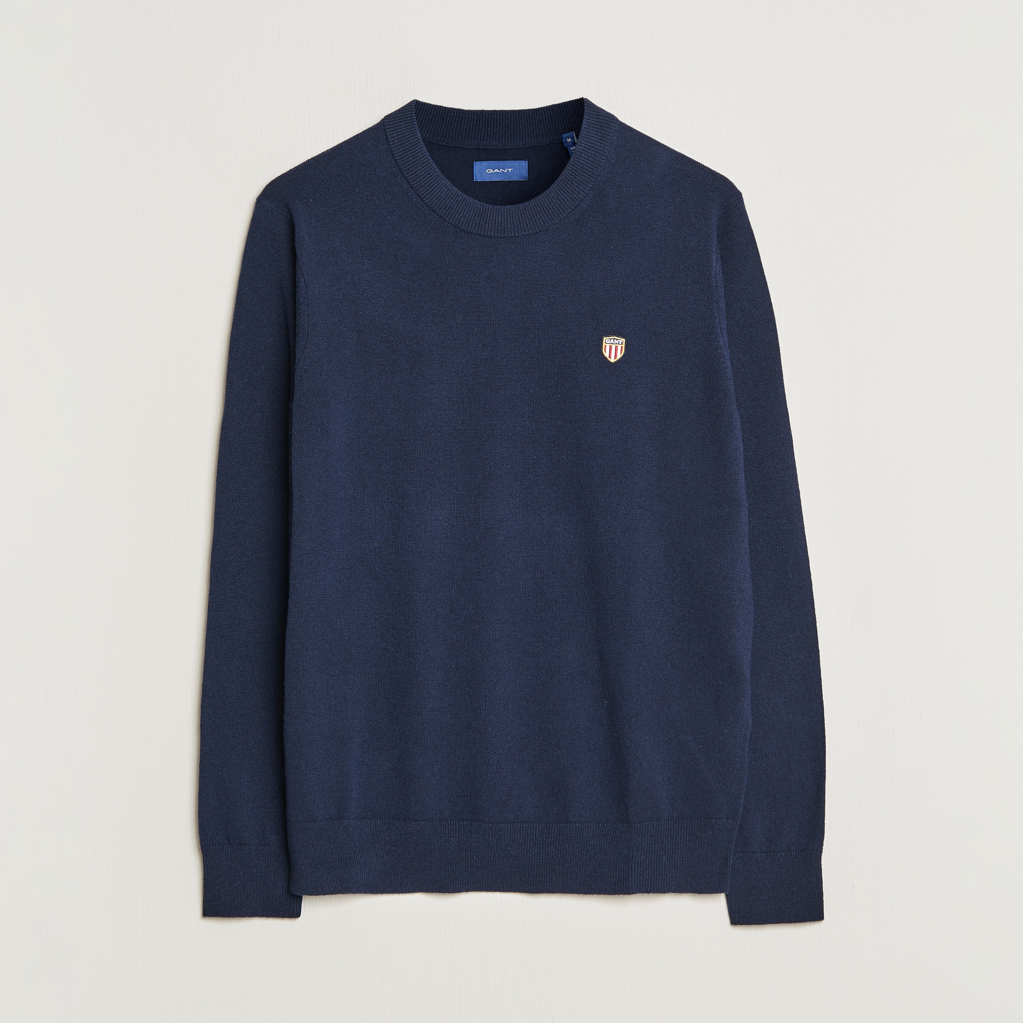 GANT Banner Shield Lambswool Crew Neck Eavning Blue at CareOfCarl.com