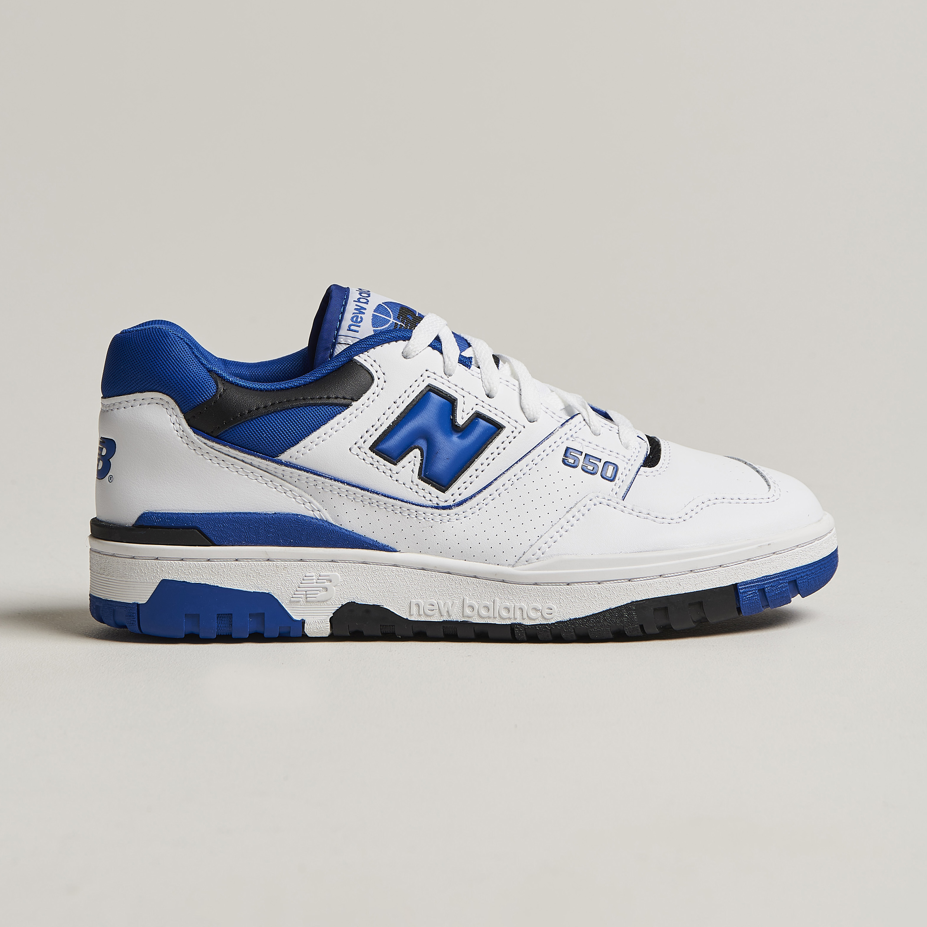 New Balance 550 Sneakers White/Royal at CareOfCarl.com