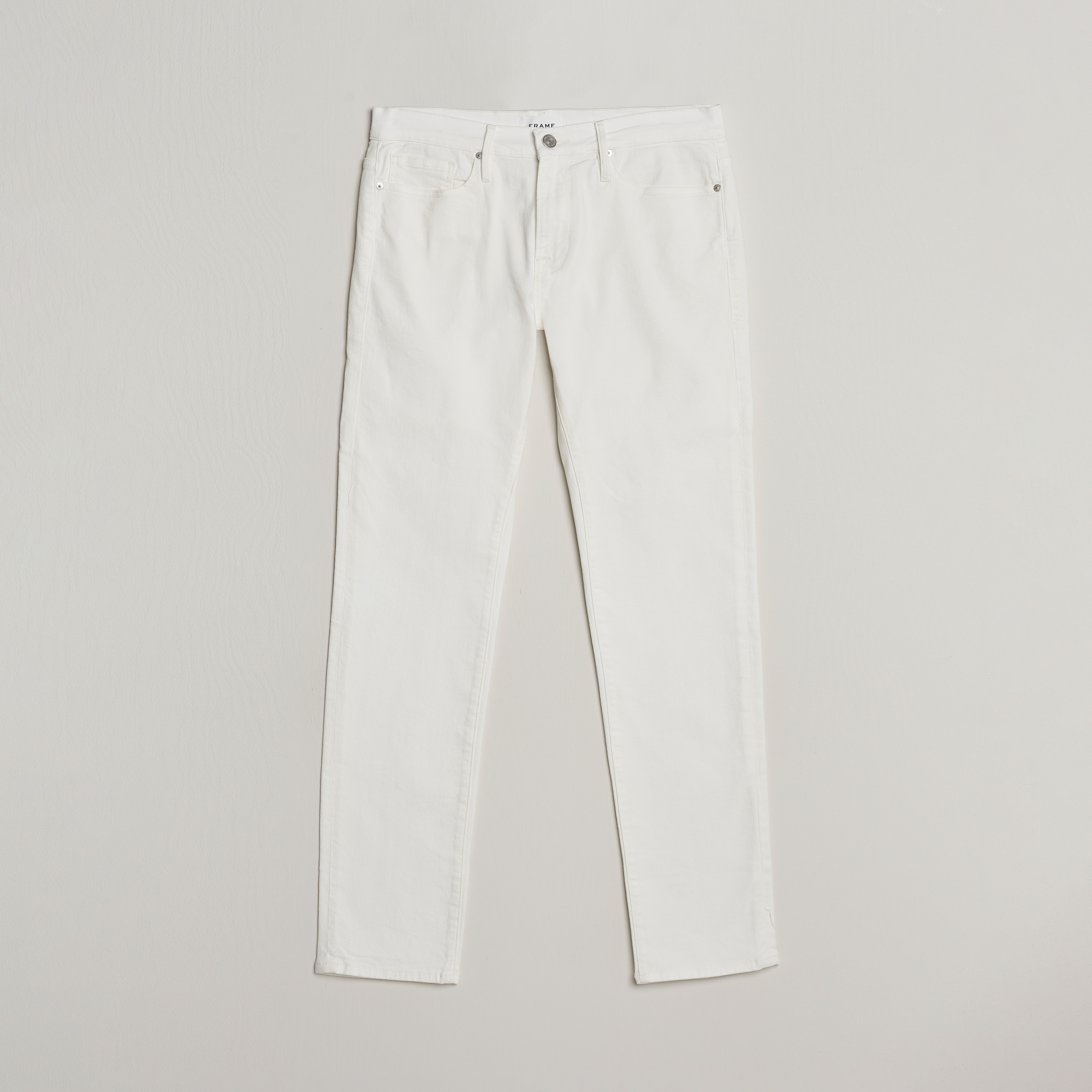 FRAME L'Homme Slim Stretch Jeans Whisper White at CareOfCarl.com