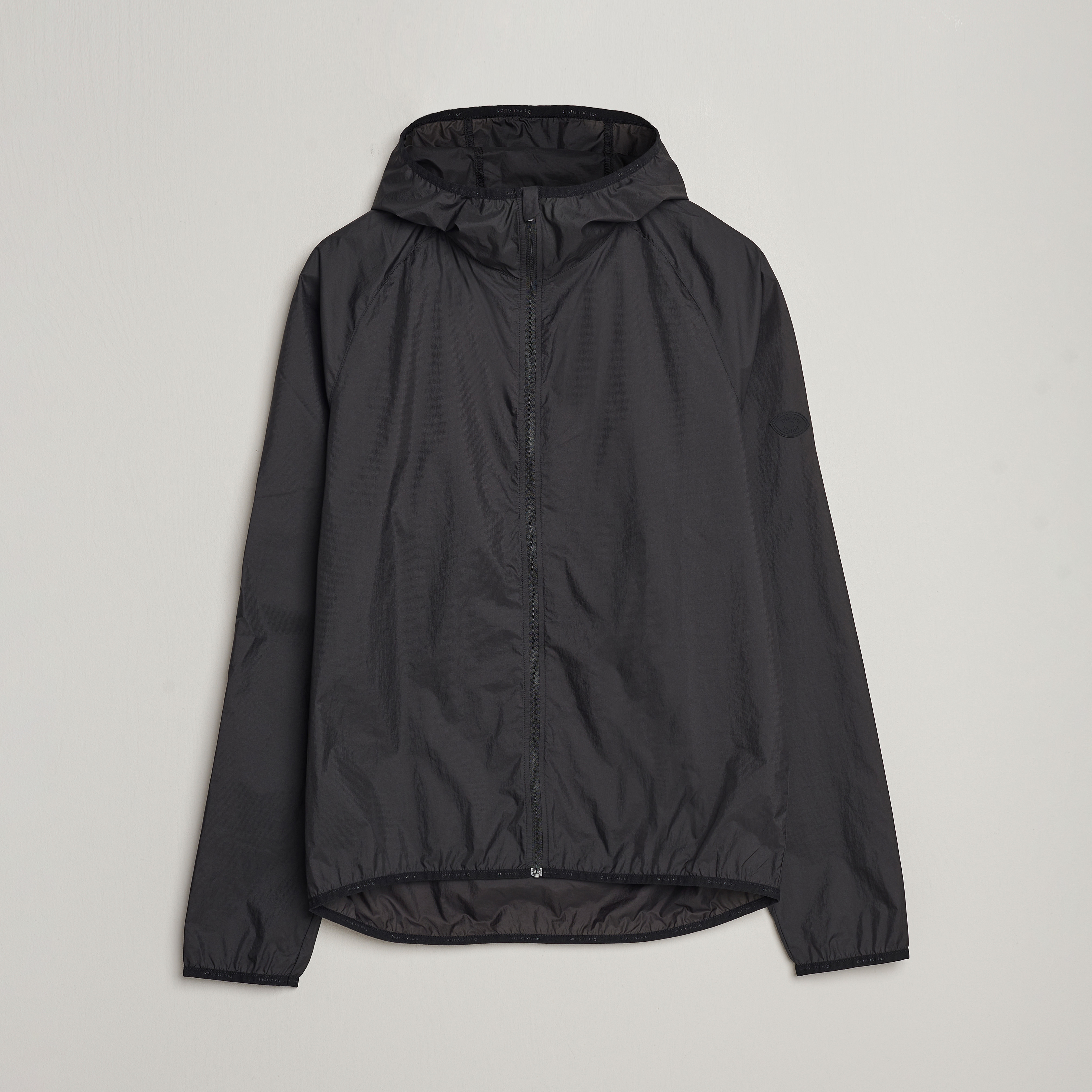District Vision Ultralight Packable DWR Wind Jacket Black at CareOfCarl.com