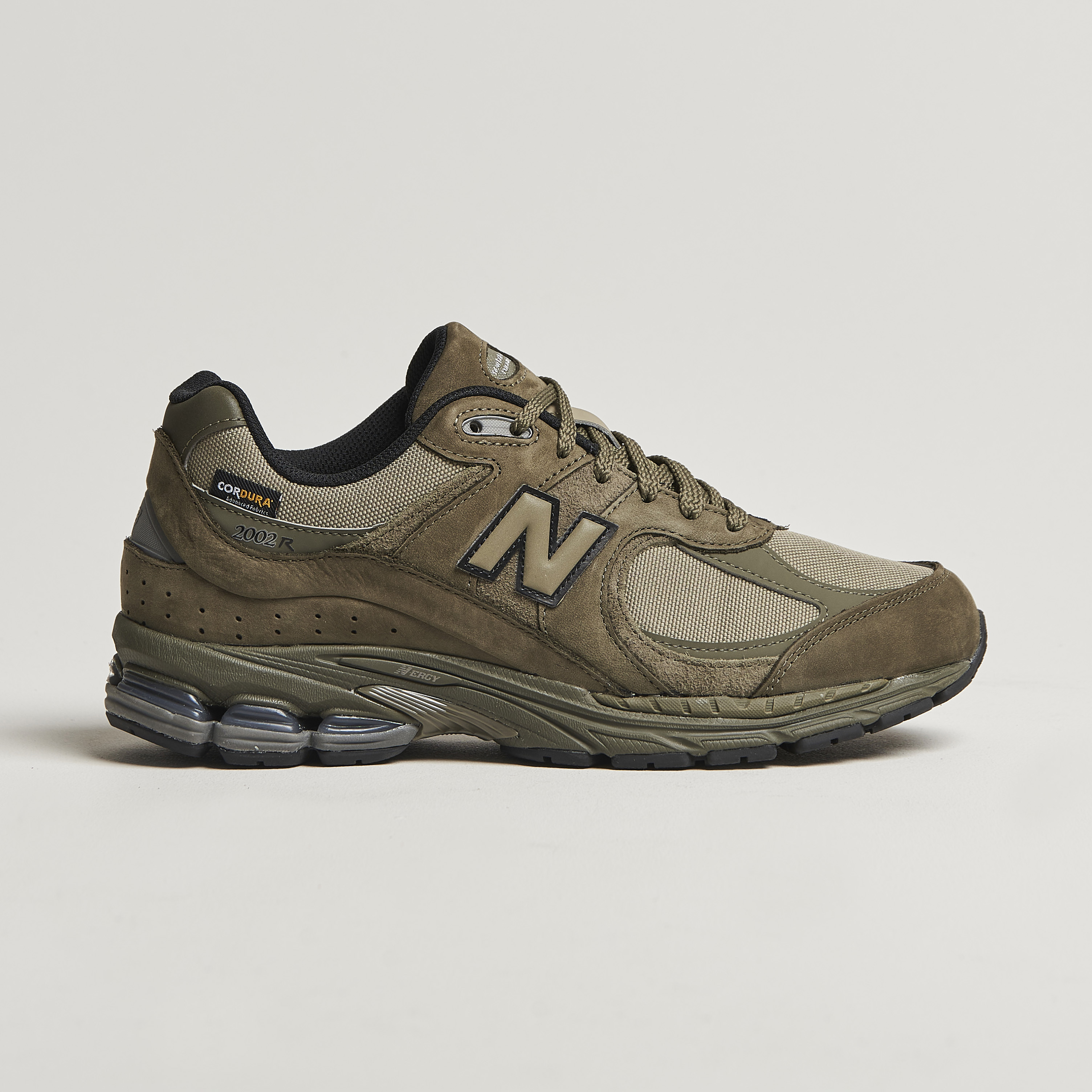 New Balance 2002R Sneakers Dark Green at CareOfCarl.com