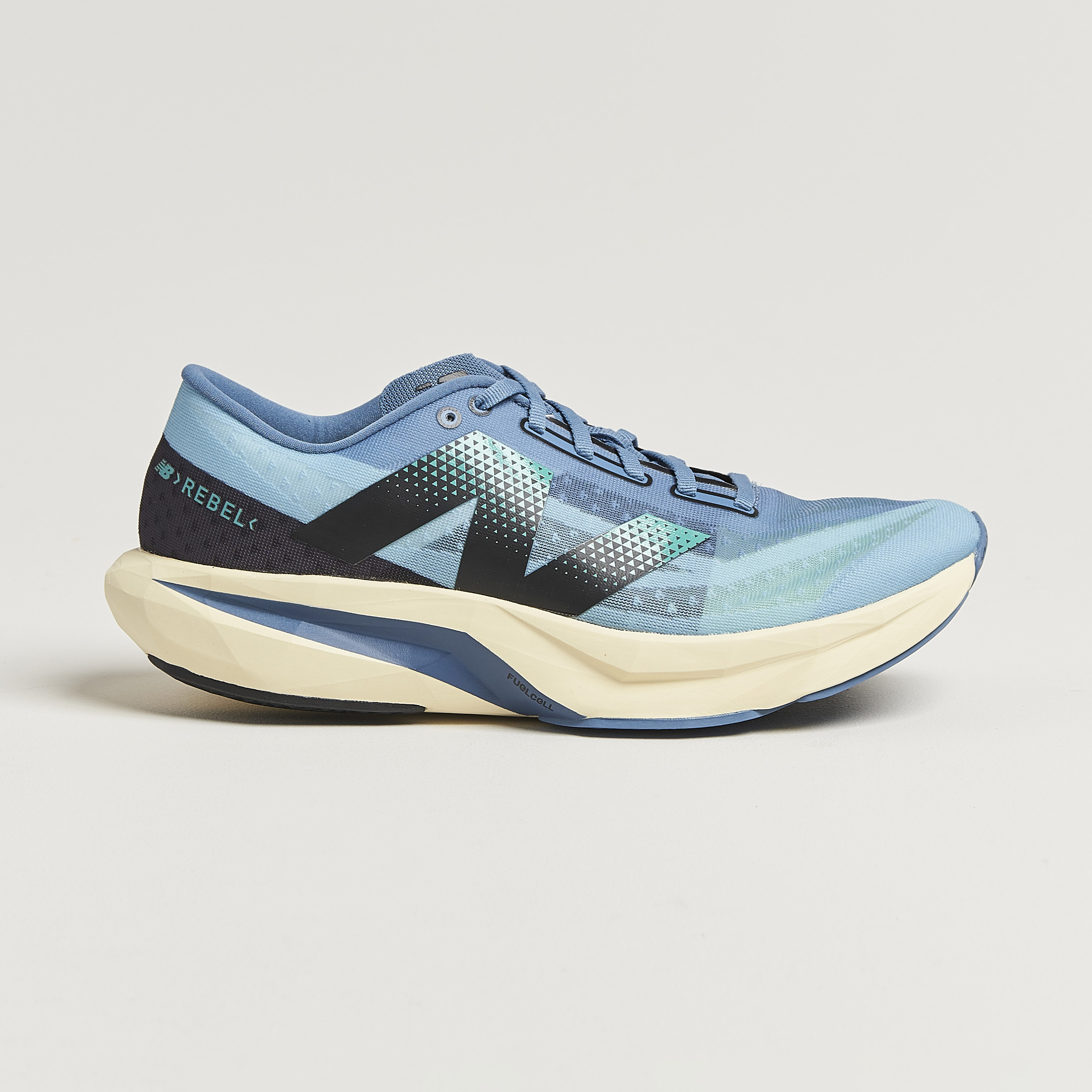 New Balance Running FuelCell Rebel v4 Blue at CareOfCarl.com