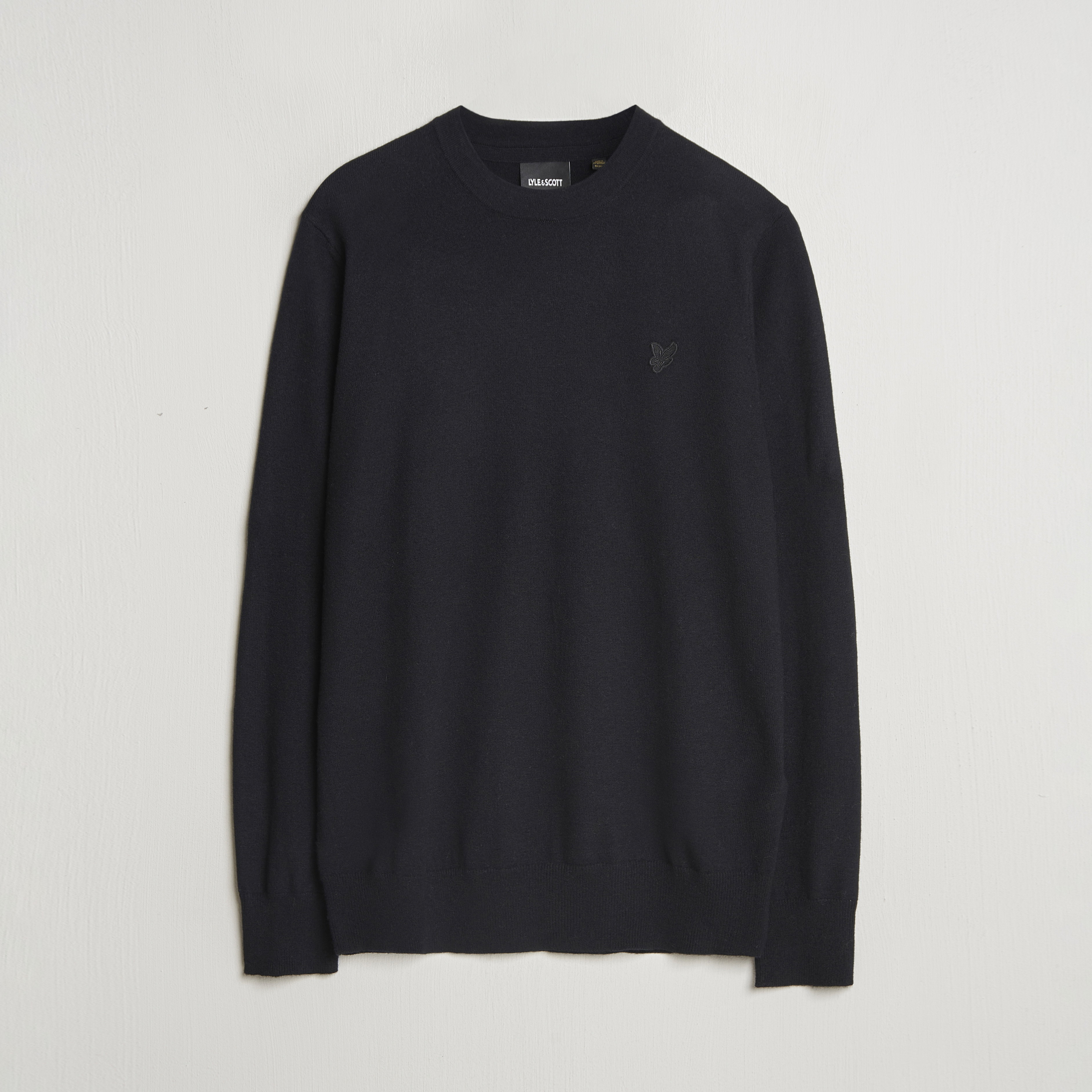 Lyle & Scott Tonal Eagle Lambswool Crew Neck Jet Black at CareOfCarl.com