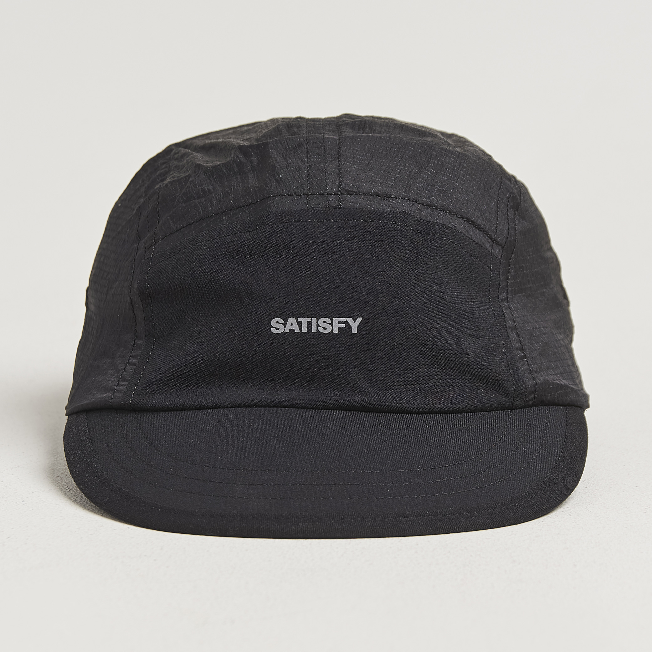 Satisfy Rippy Trail Cap Black at CareOfCarl.com
