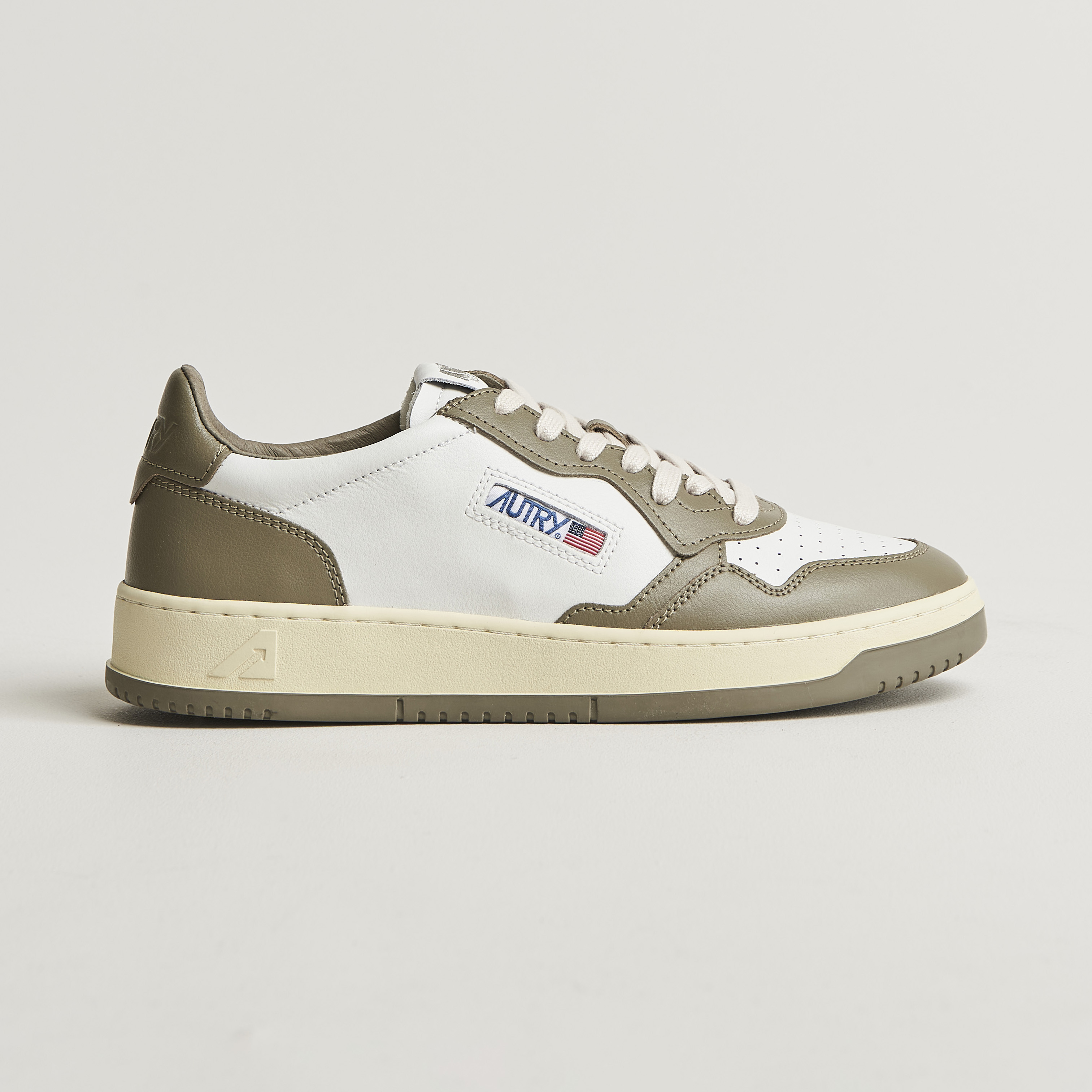 Autry Medalist Low Super Soft Leather Sneaker White/Covert Green at CareOfC