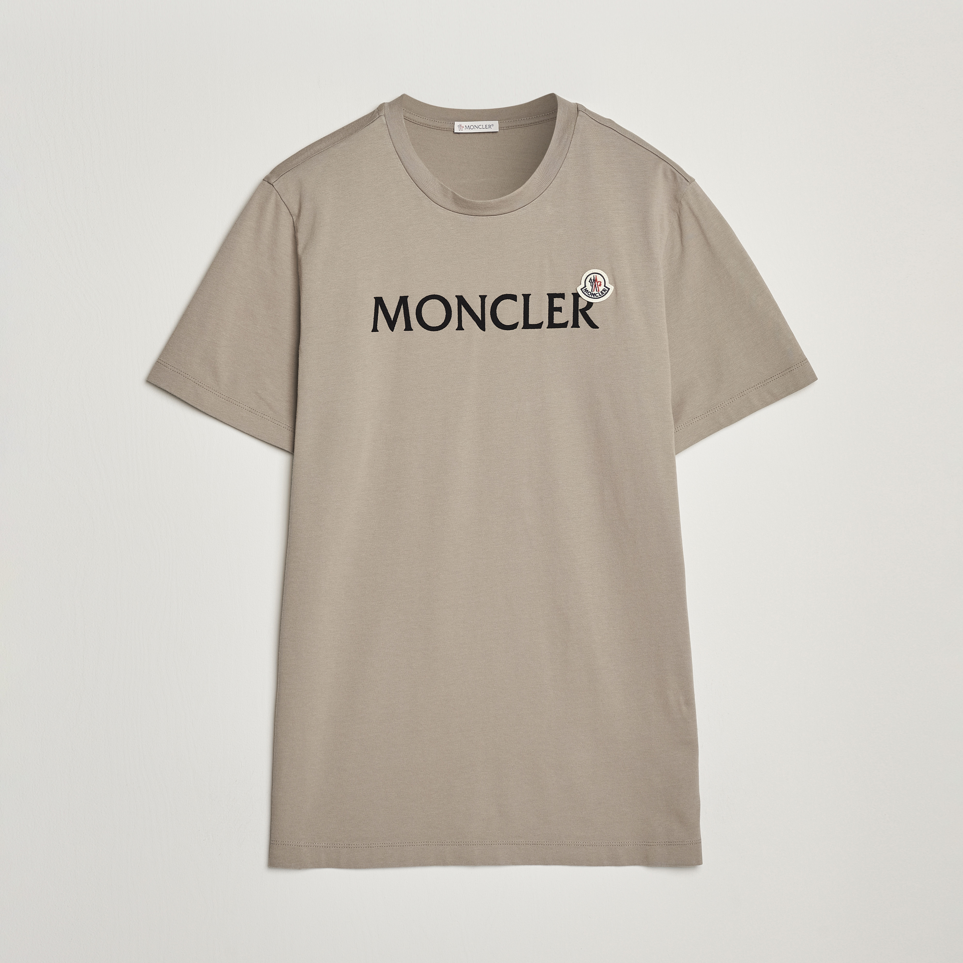 Moncler Lettering Logo T-Shirt Beige at CareOfCarl.com