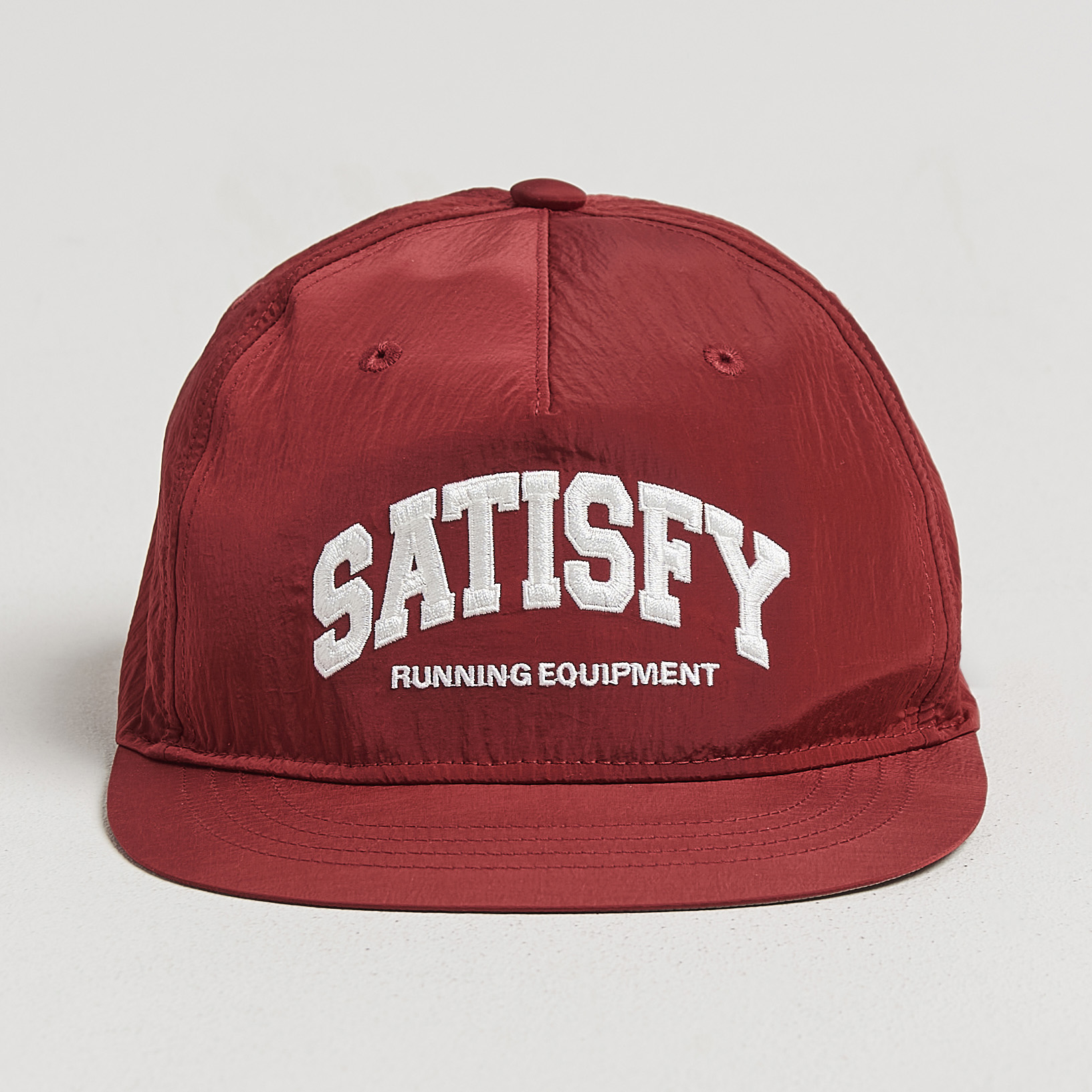Satisfy FliteSilk Running Cap Burgundy at CareOfCarl.com