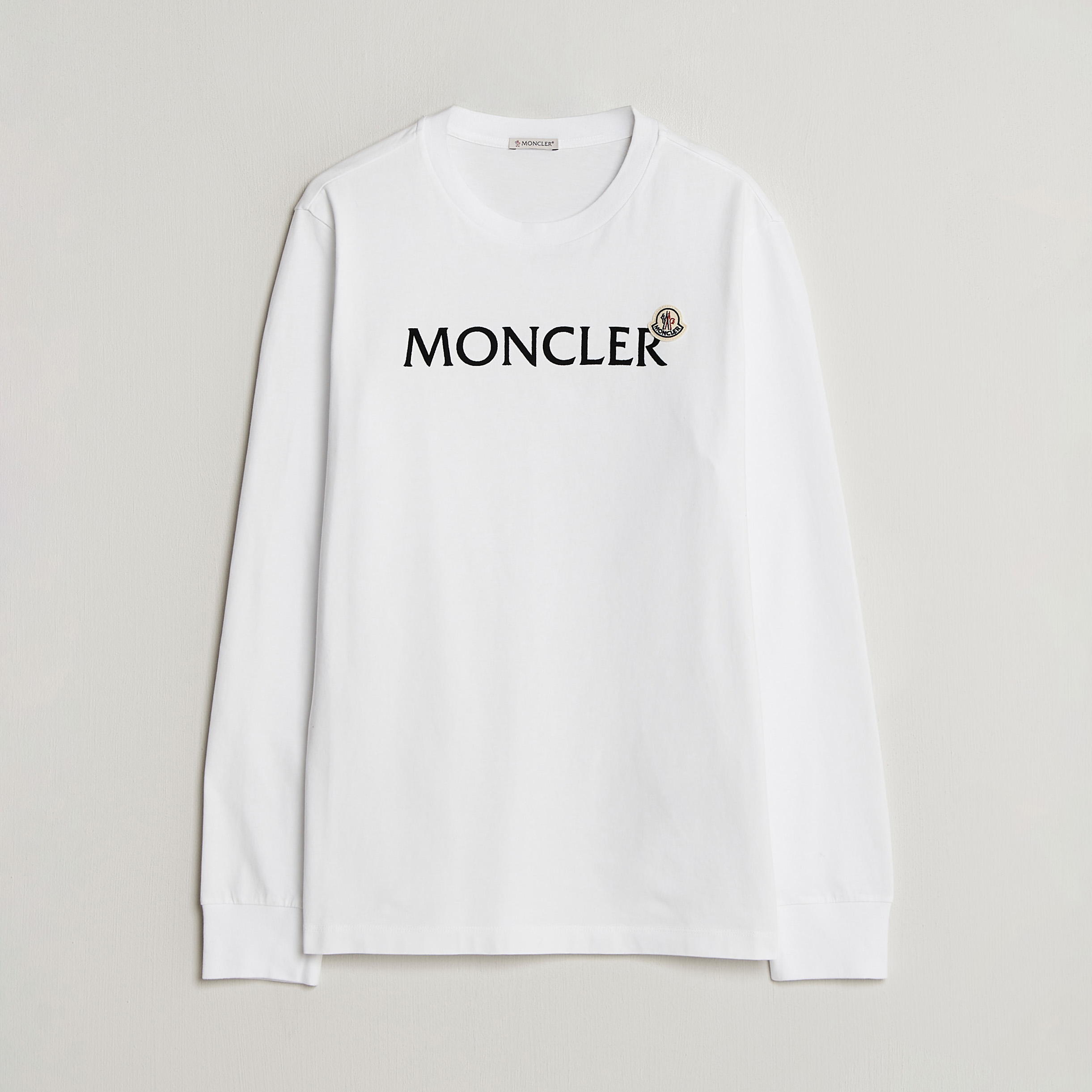 Moncler Lettering Logo Long Sleeve T-Shirt White at CareOfCarl.com