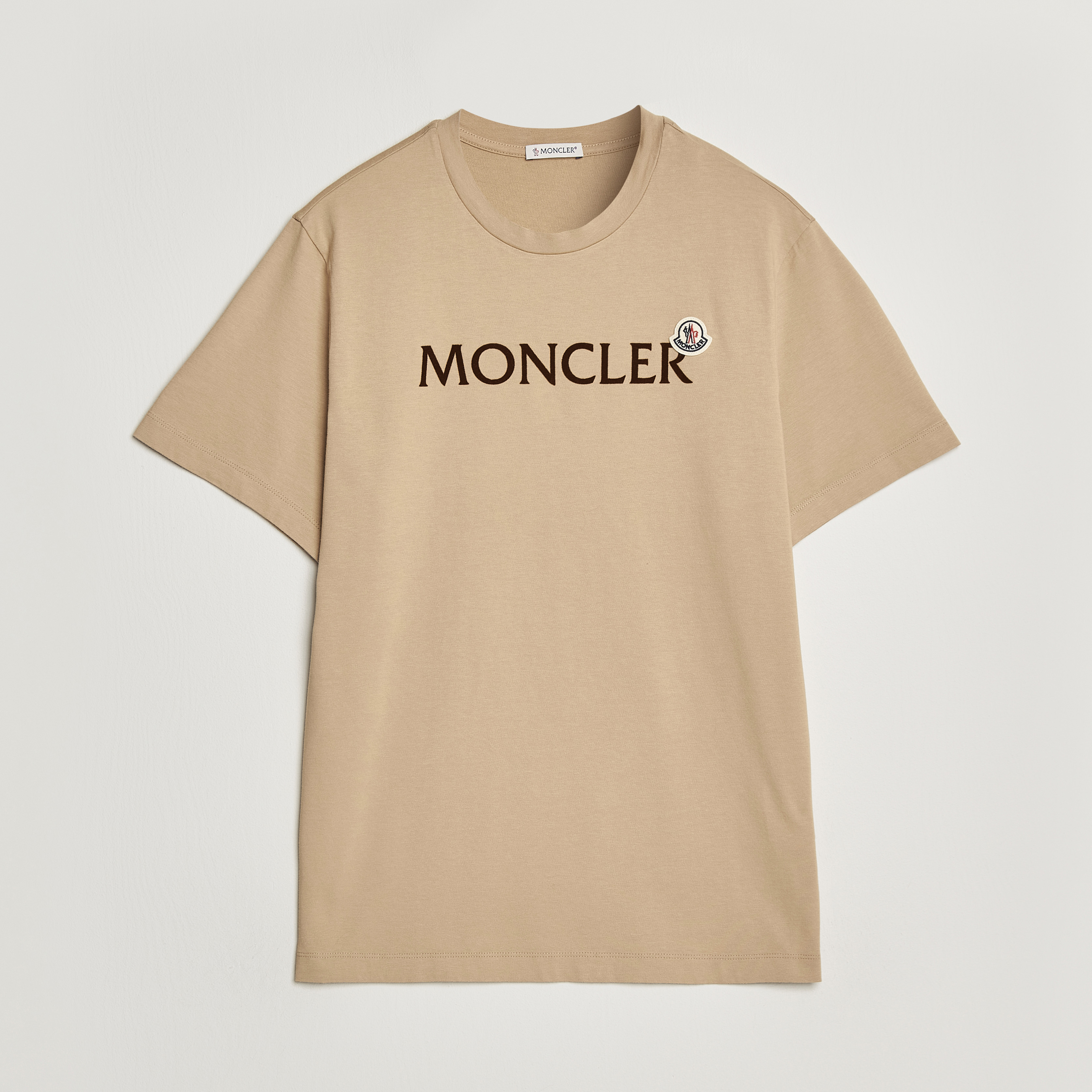 Moncler Lettering Logo T-Shirt Beige at CareOfCarl.com