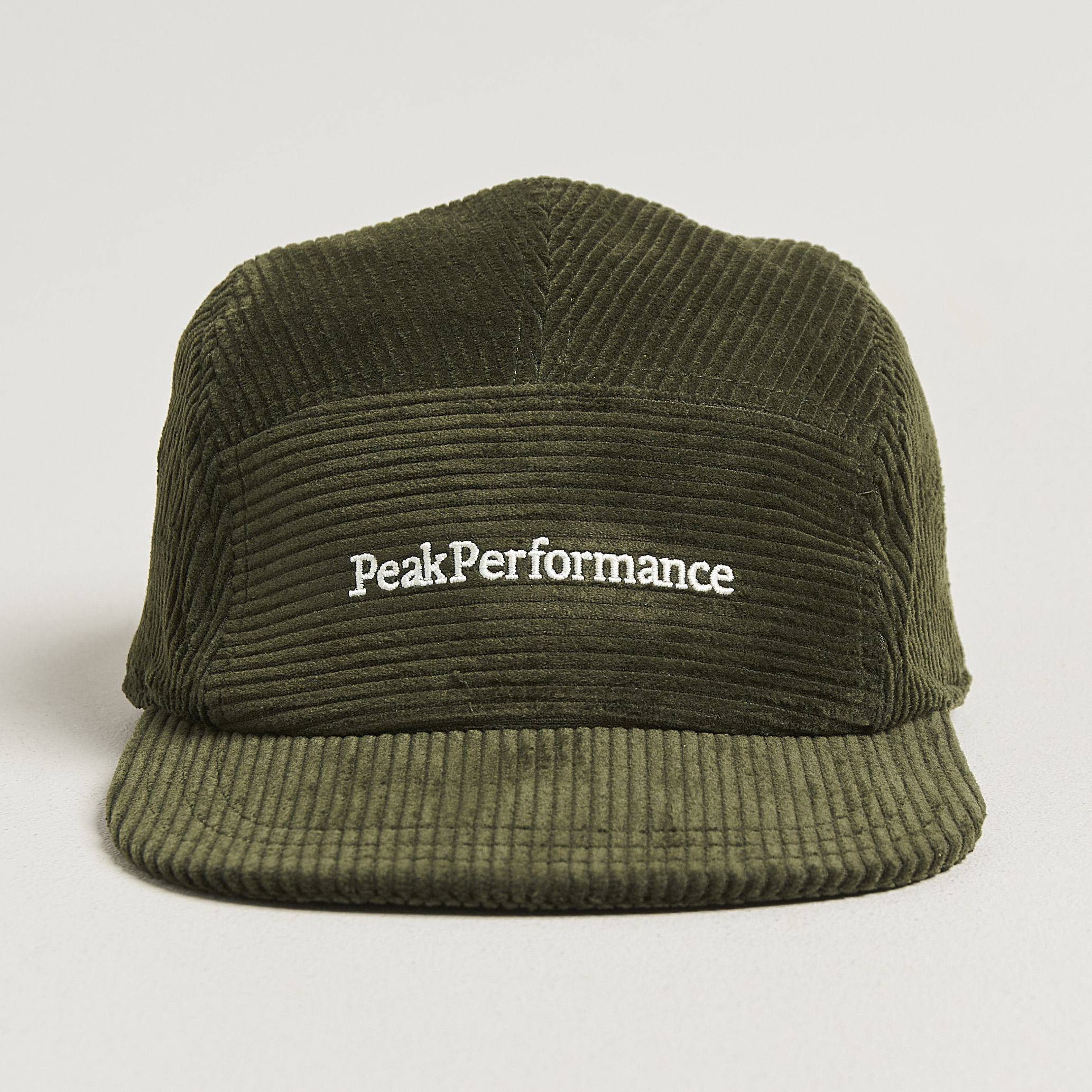 Peak Performance Cord Cap Pine Needle at CareOfCarl.com