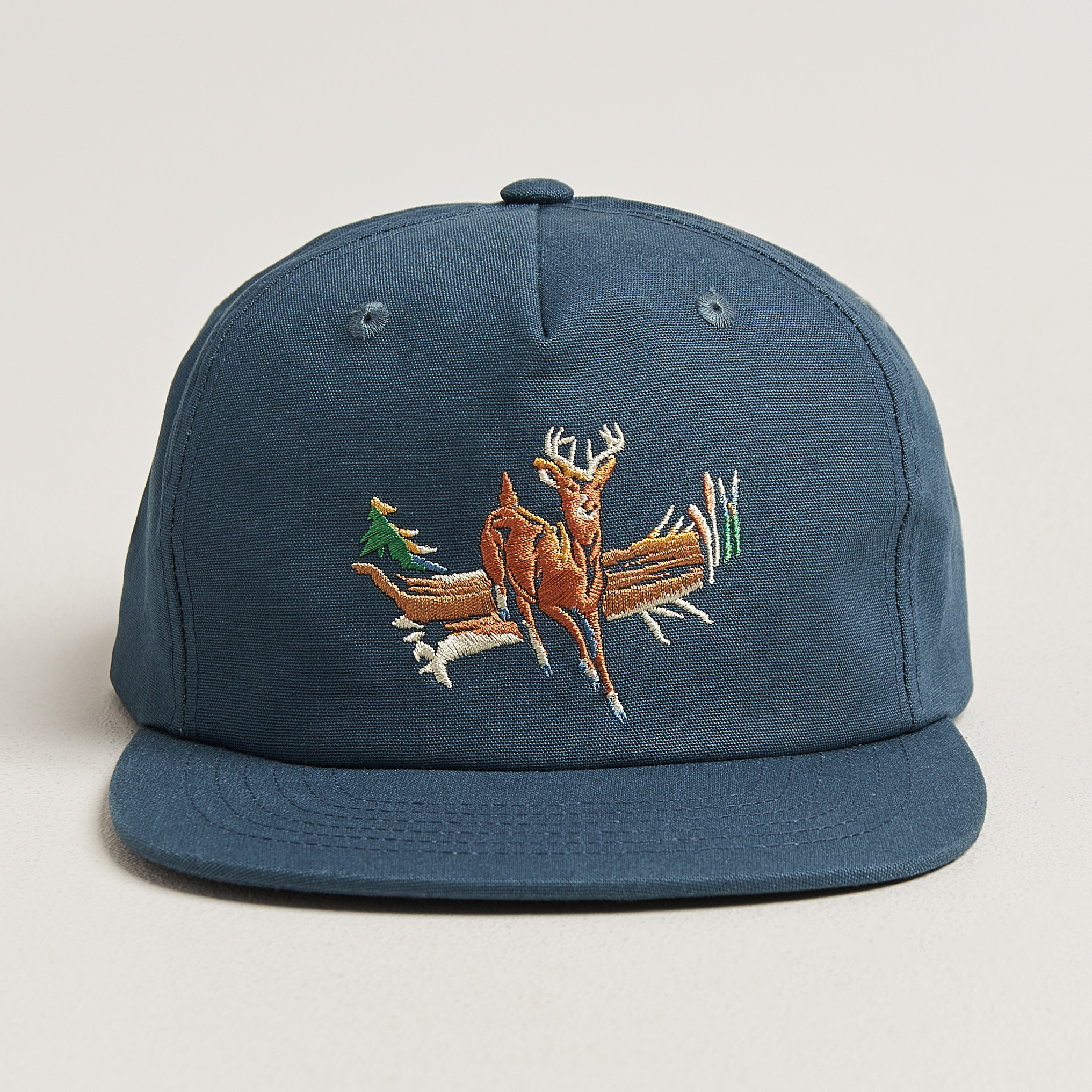 Filson Deer Trucker Cap Dusty Blue at CareOfCarl.com