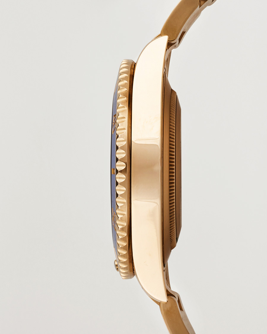 Rolex Pre-Owned Submariner Date 18K 116618LB Gold at CareOfCarl.com